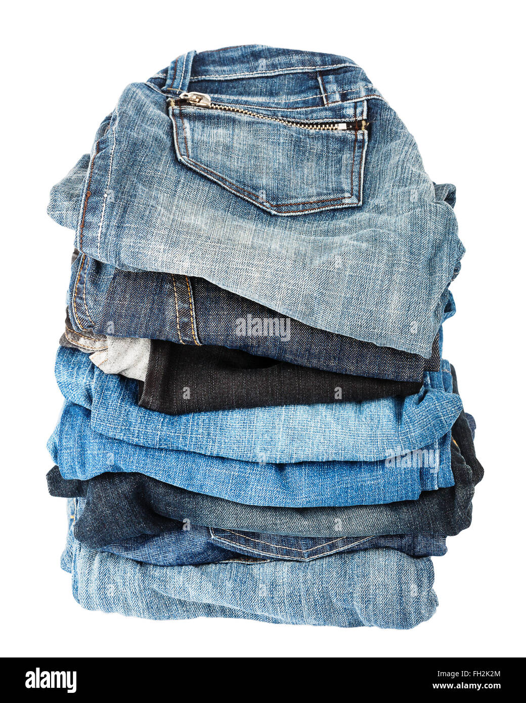 Stack of jeans isolated on white background Stock Photo - Alamy