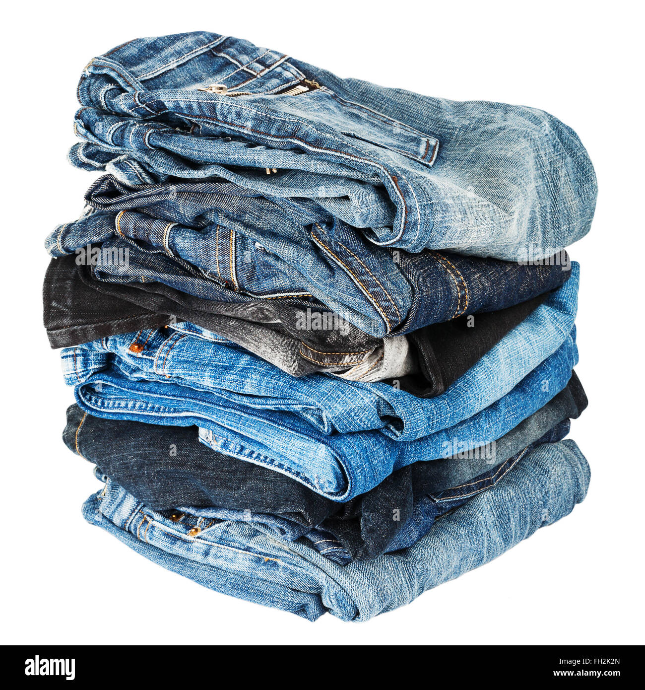 Stack of jeans isolated on white background Stock Photo - Alamy