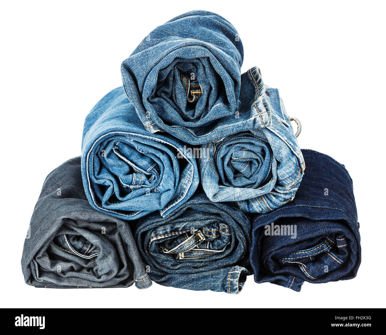 Stack of jeans isolated on white background Stock Photo - Alamy