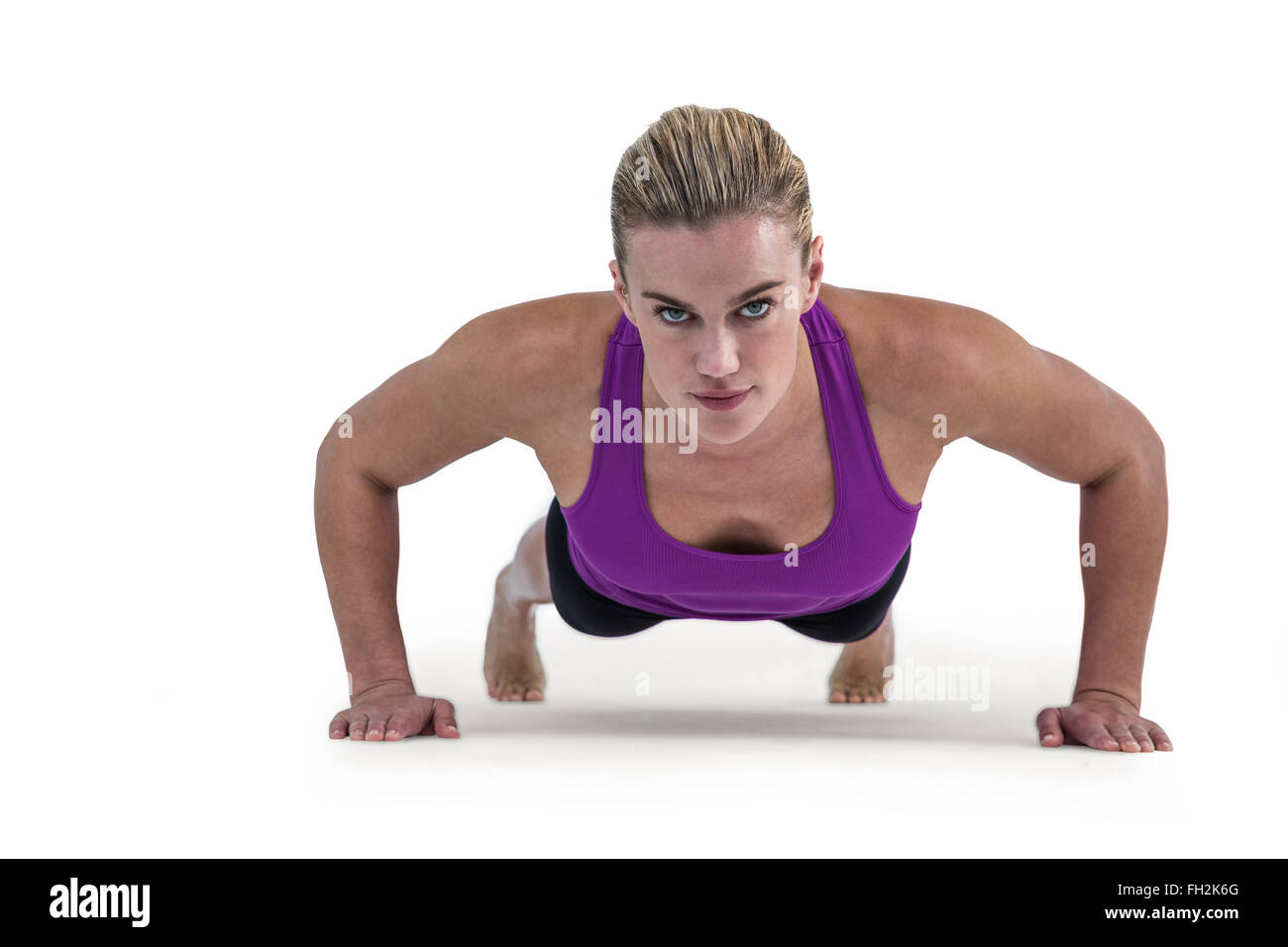 Muscular woman doing push ups Stock Photo - Alamy