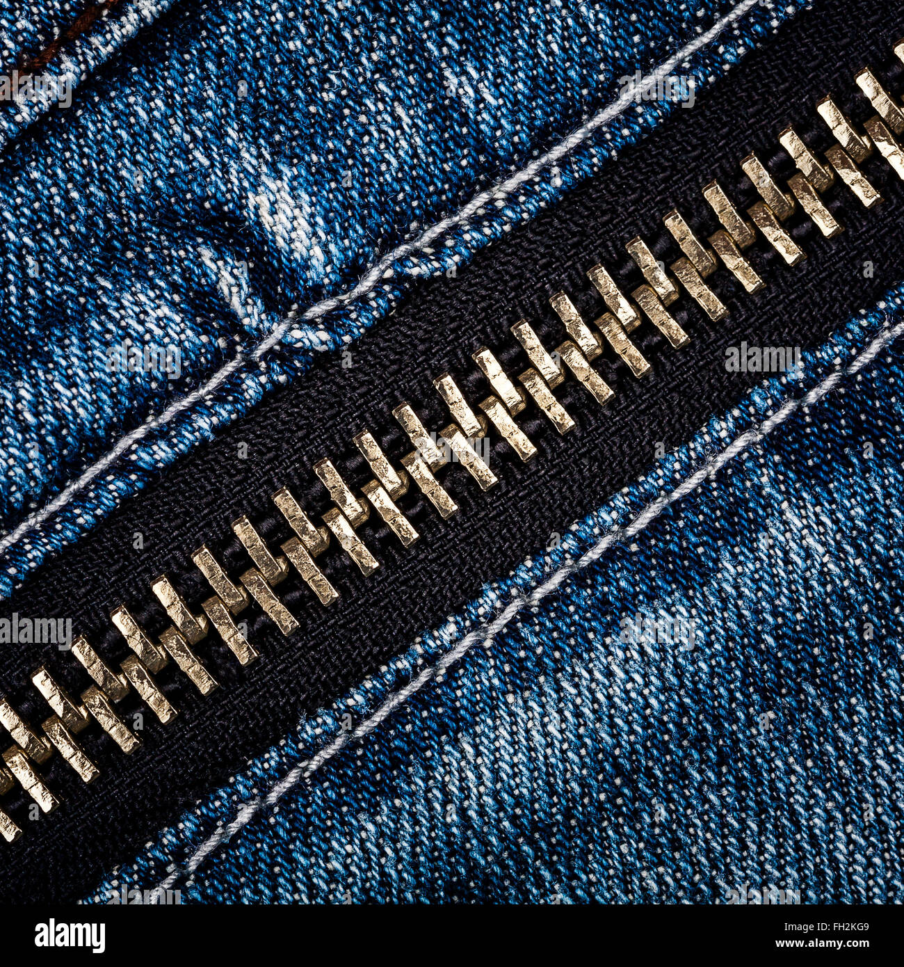 Zipper on a blue jeans Stock Photo - Alamy