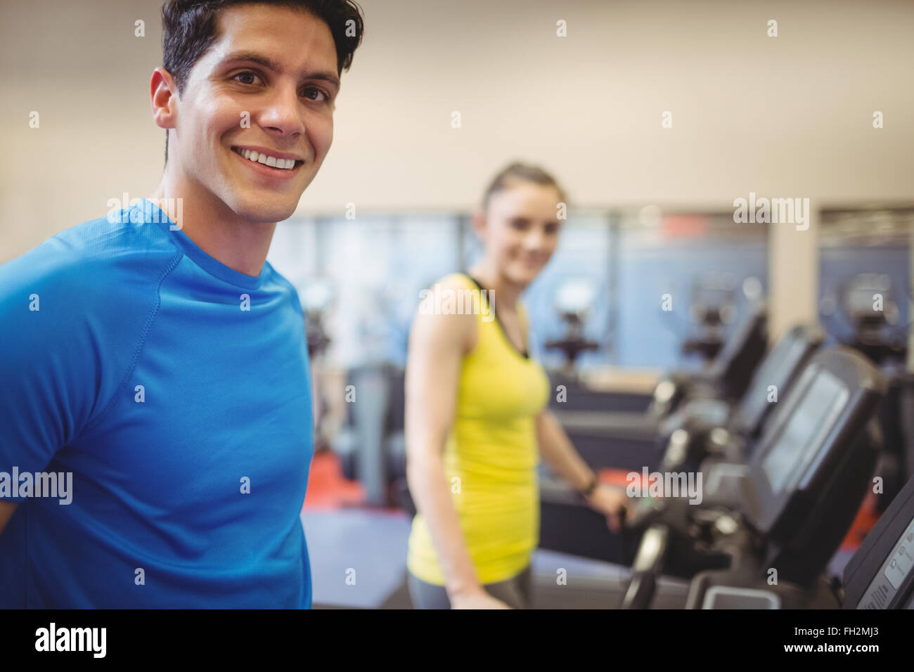 Fit people using the treadmill Stock Photo - Alamy