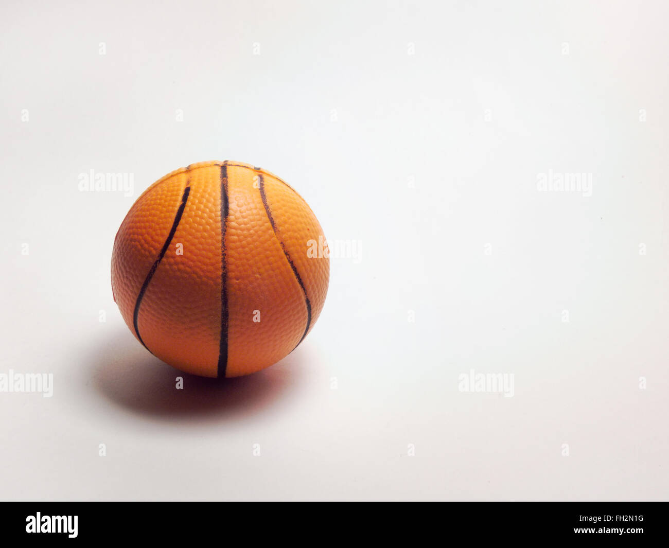 souvenir small basketball ball on white Stock Photo - Alamy