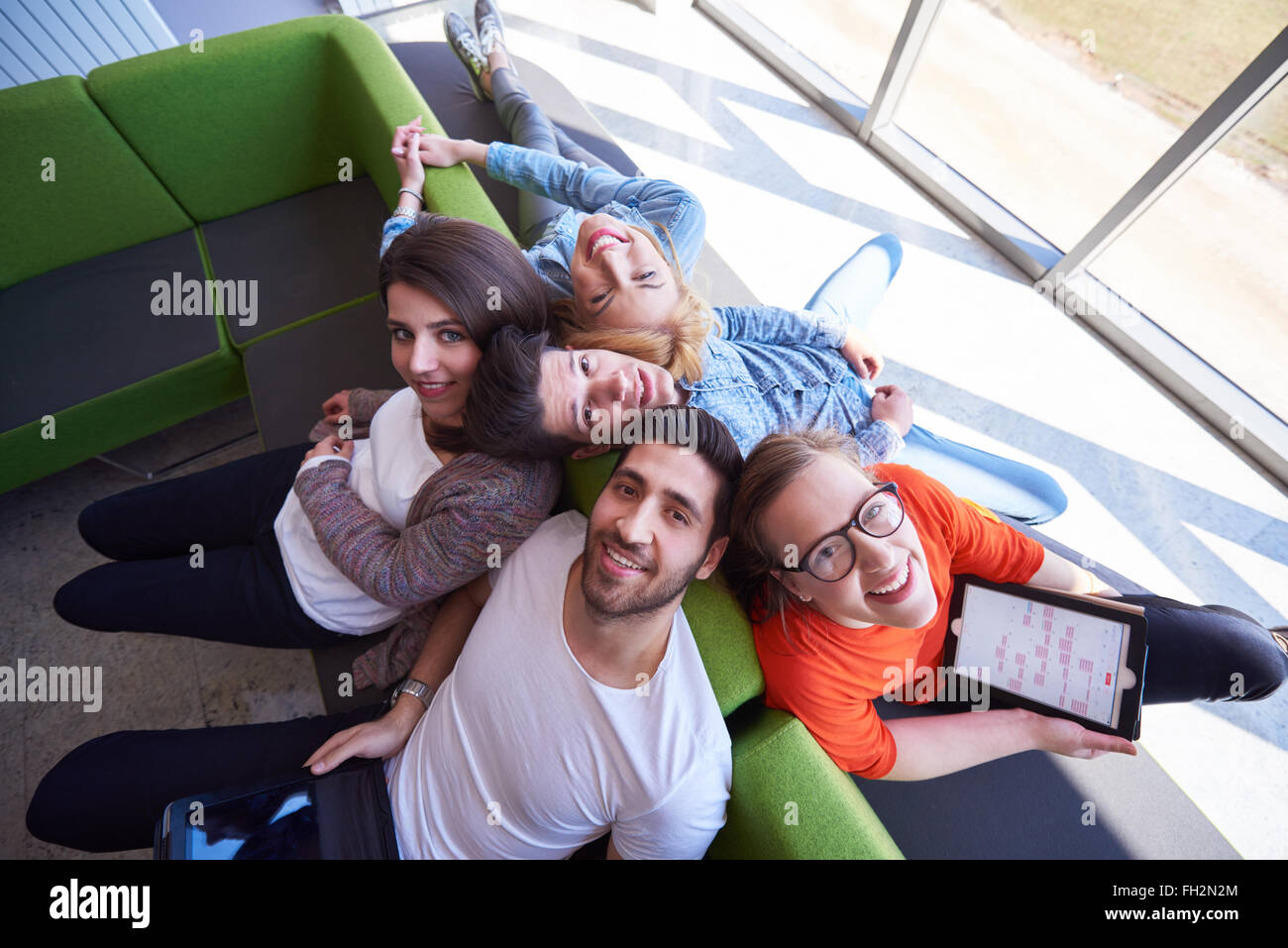 students group working on school project together Stock Photo - Alamy