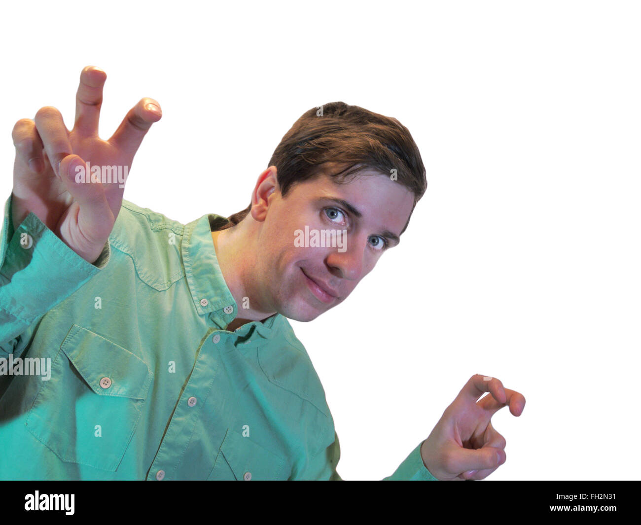 a young man shows air quotes with an easy grin Stock Photo - Alamy