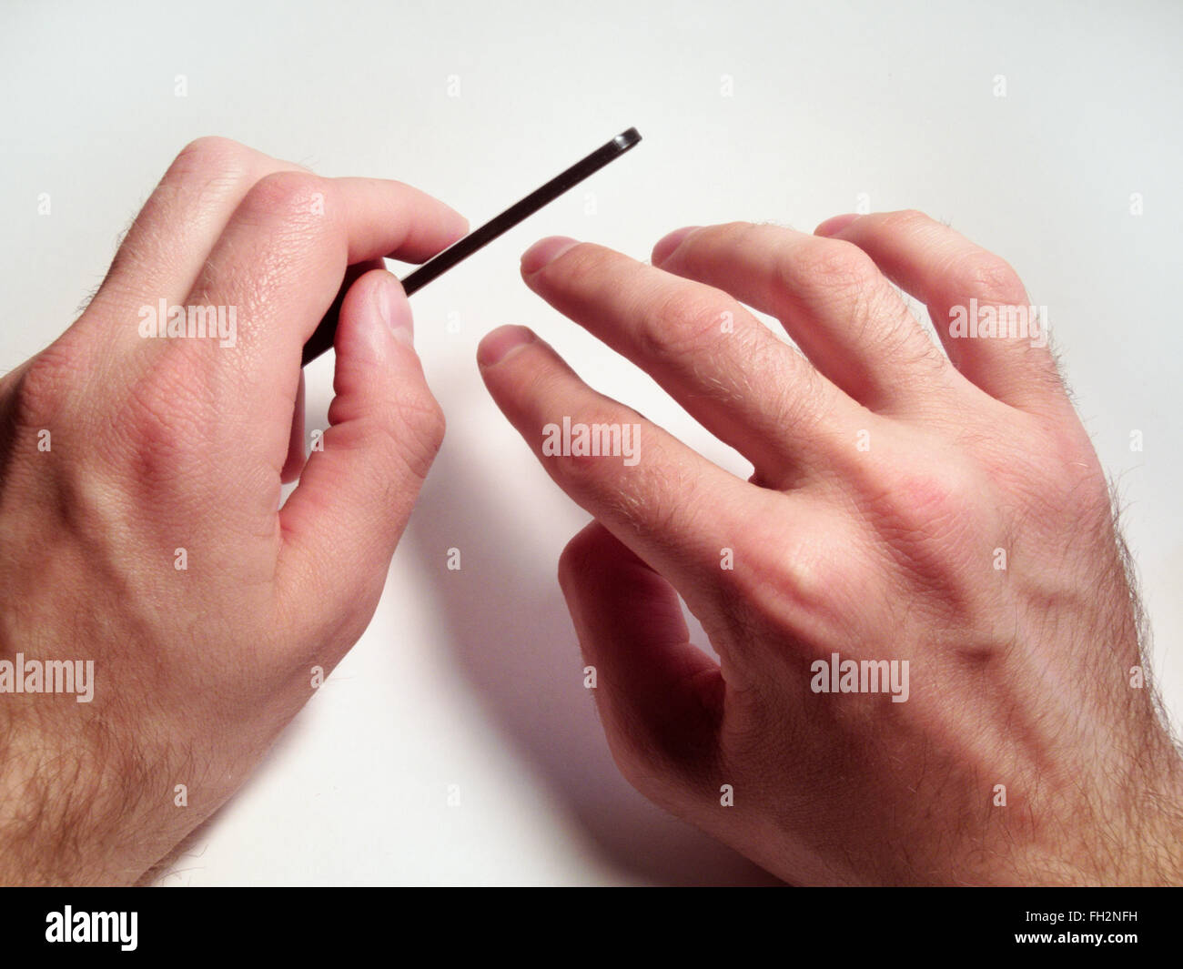Mans thumb nail hi-res stock photography and images - Alamy