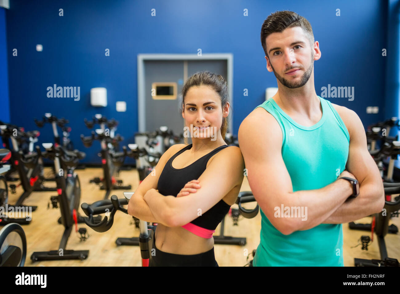 Focused couple working out together Stock Photo - Alamy