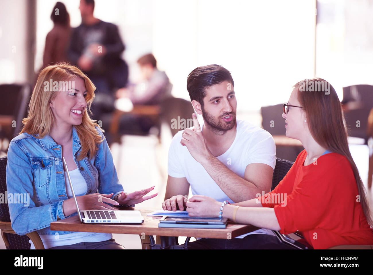 students group working on school project together Stock Photo - Alamy
