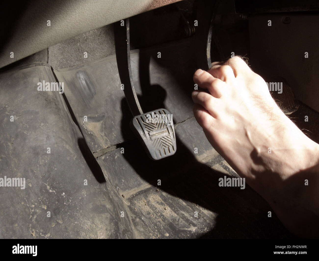 barefoot foot on brake pedal Stock Photo - Alamy