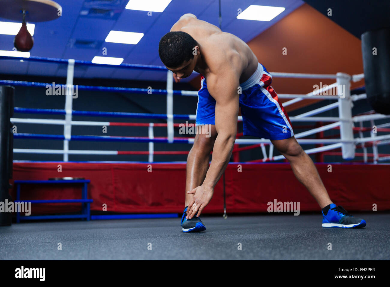 Boxer doing warm up exercises near boxing ring Stock Photo - Alamy