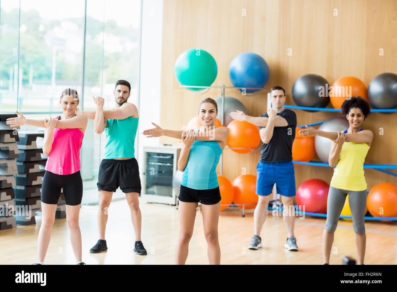 Fitness class exercising in the studio Stock Photo - Alamy