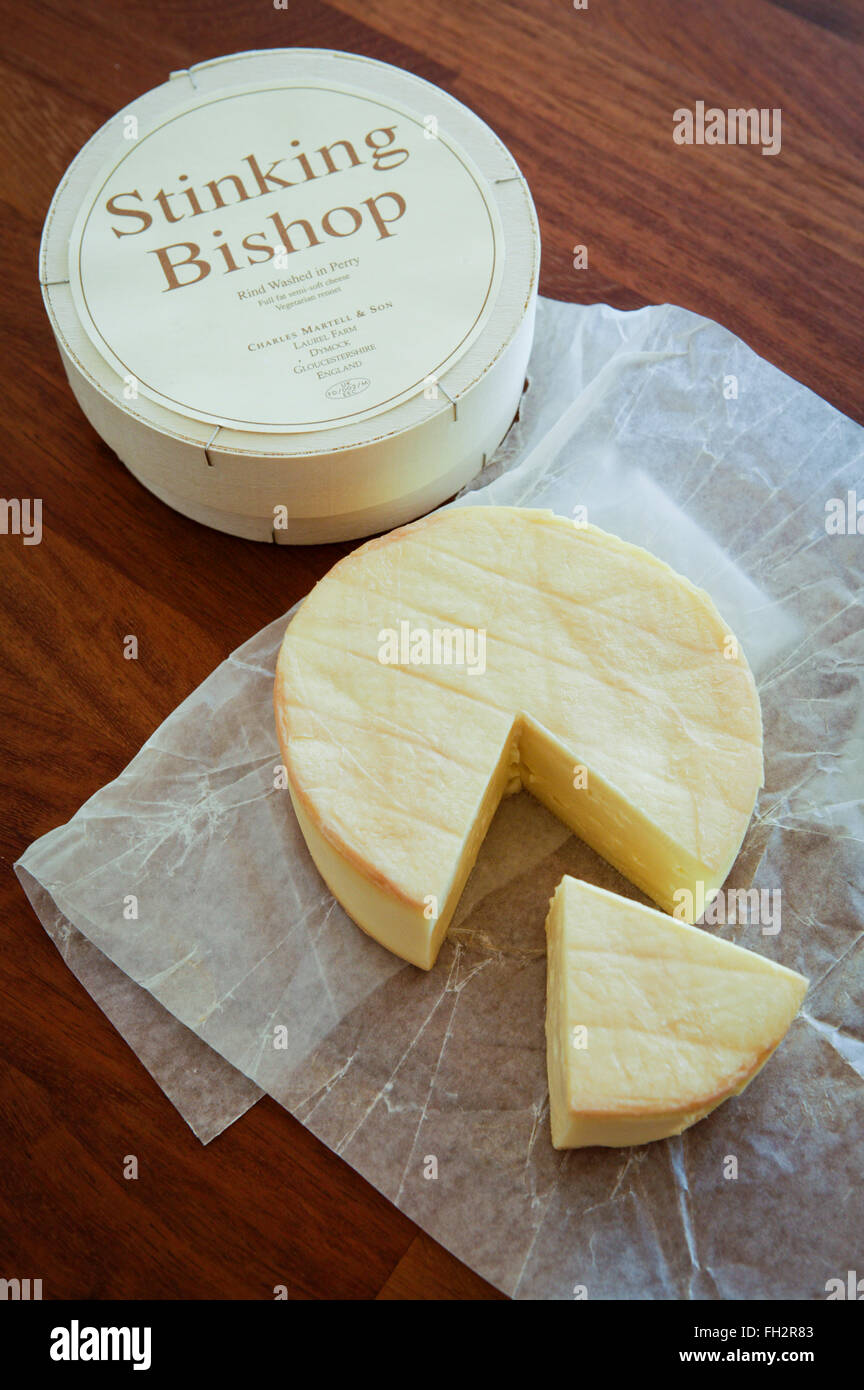 Studio style still life of round of Stinking Bishop cheese made in ...