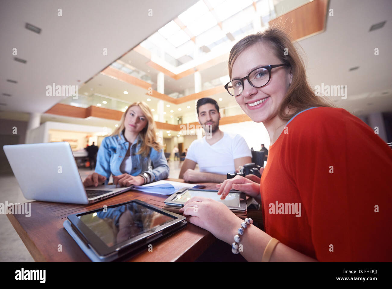 students group working on school project together Stock Photo - Alamy