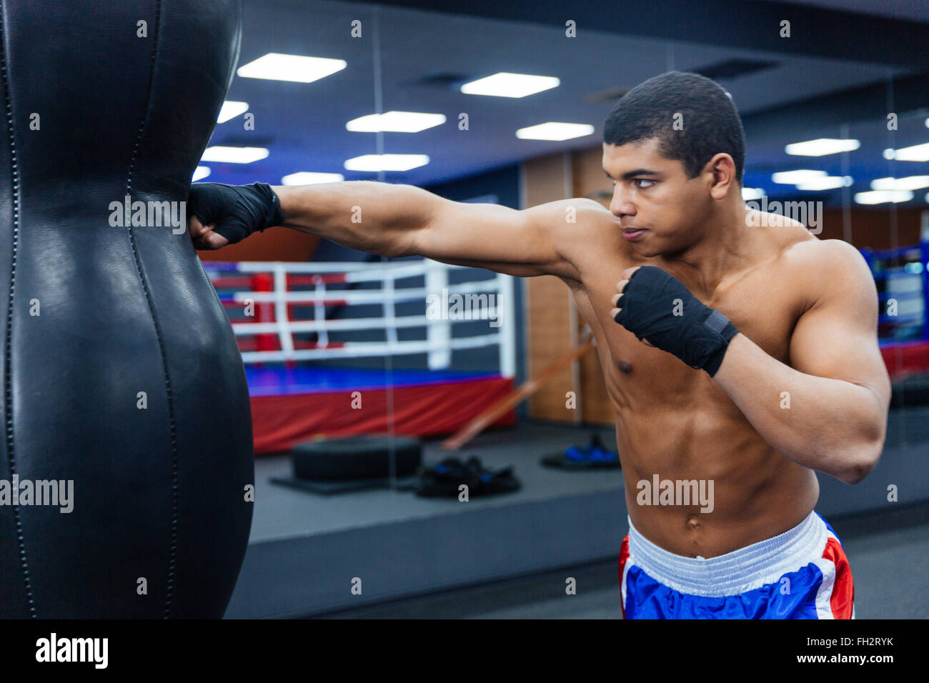 Male boxer training in gym Stock Photo - Alamy