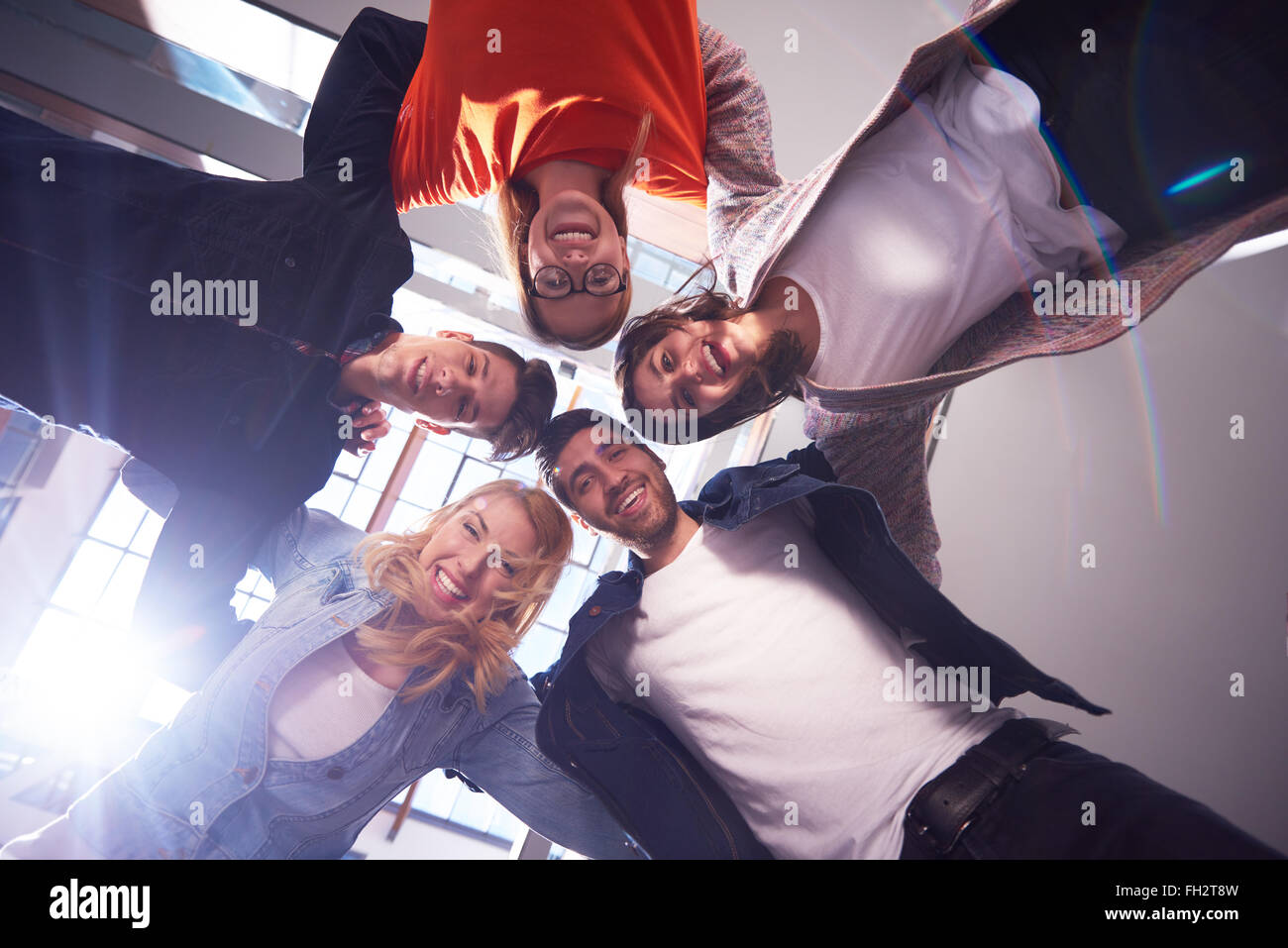 happy students celebrate Stock Photo - Alamy