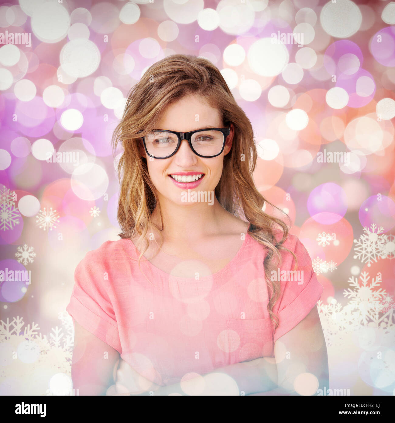 Composite image of pretty geeky hipster smiling at camera Stock Photo ...