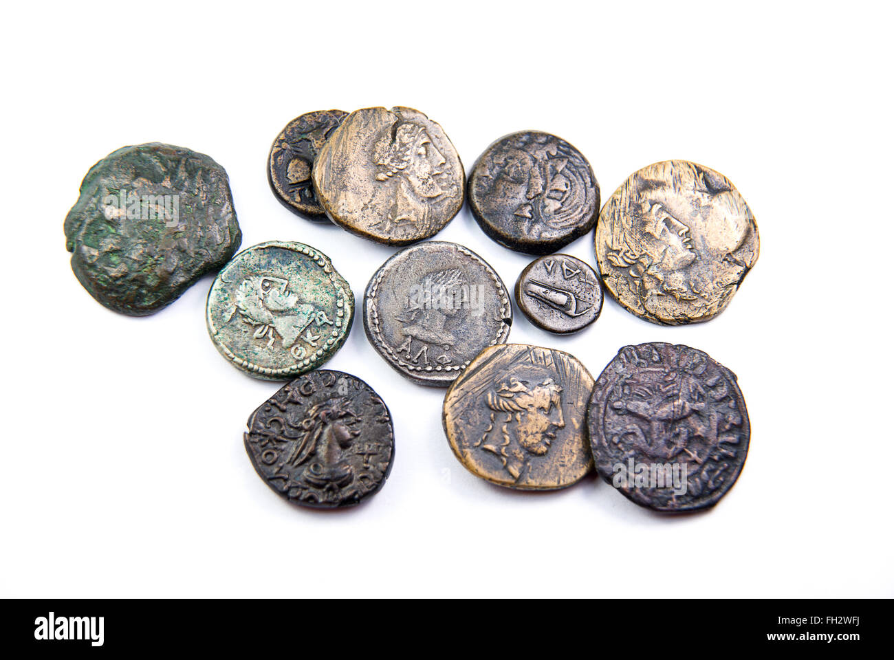 A lot of old coins with portraits of kings on a white background Stock ...