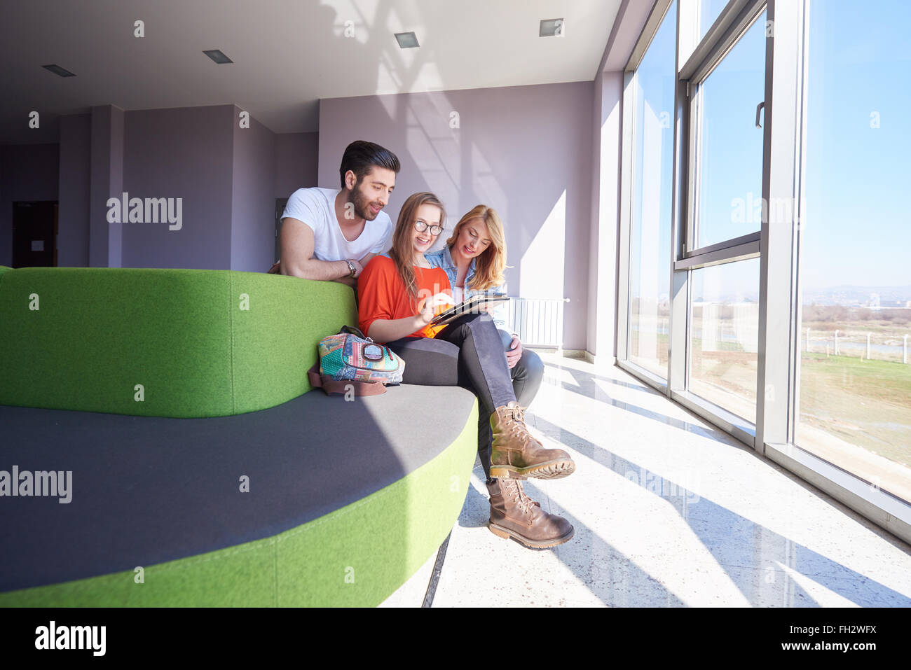 students group working on school project together Stock Photo - Alamy