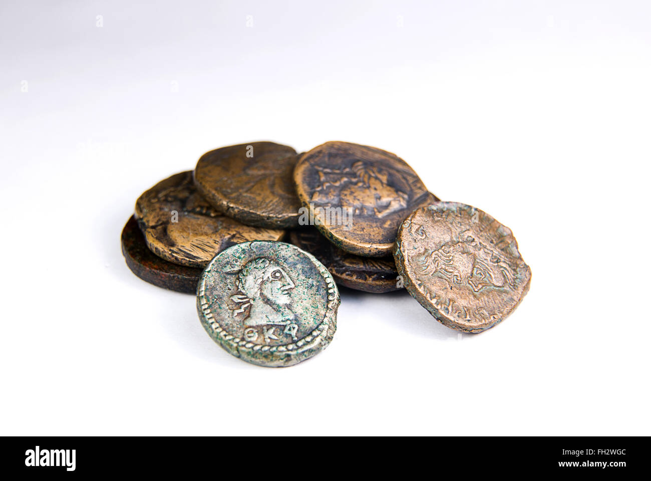 A lot of old coins with portraits of kings on a white background Stock ...