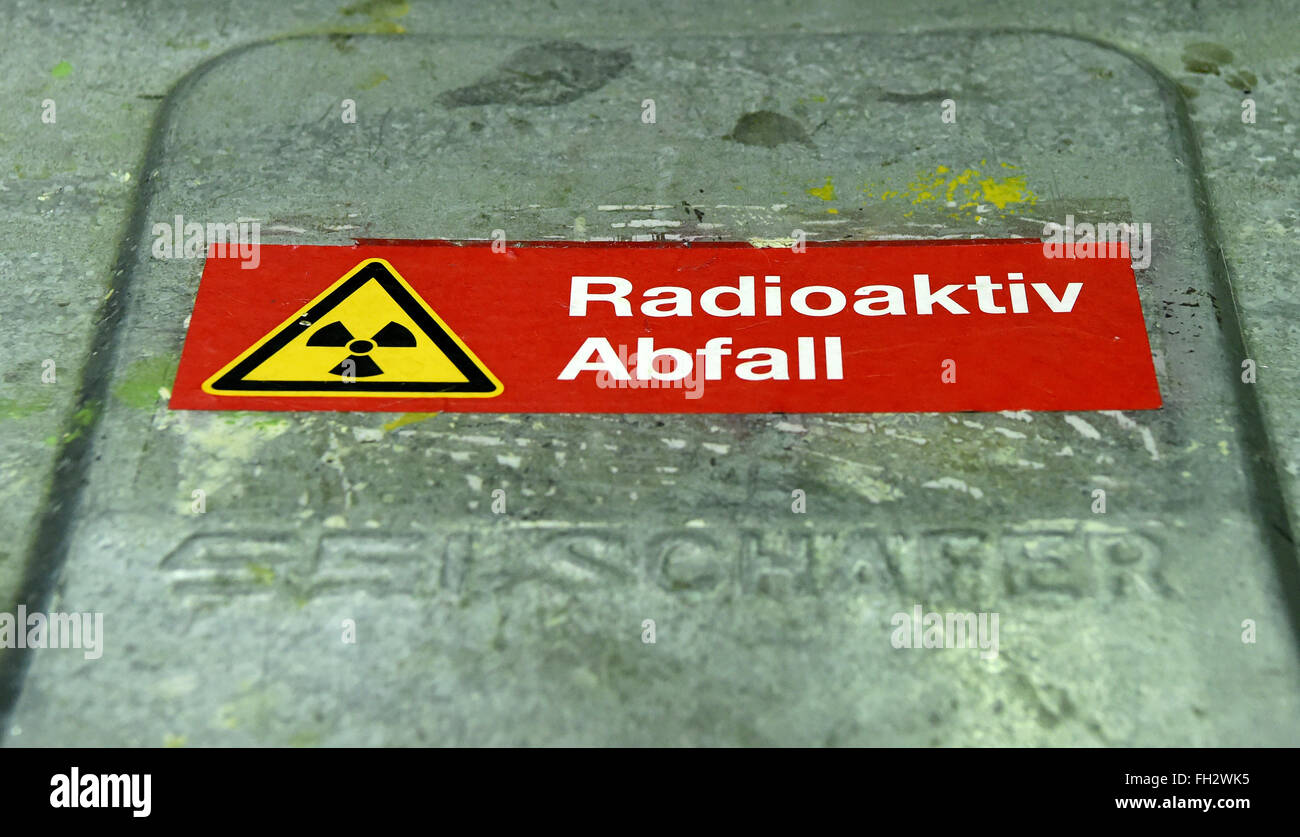 A sticker reads "Radioaktiv Abfall" (radioactive waste) on a waste ...