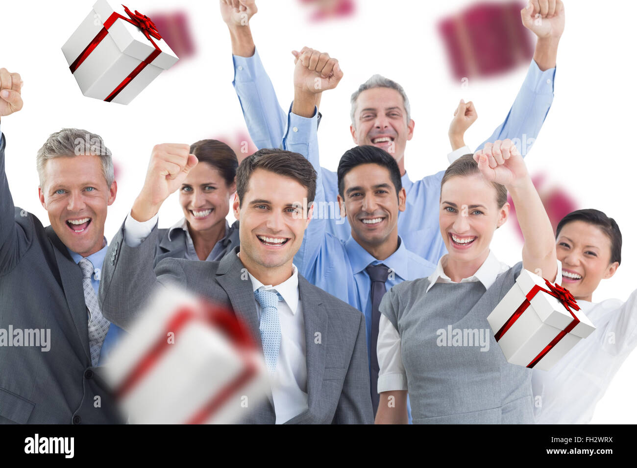 Composite image of business people cheering in office Stock Photo - Alamy