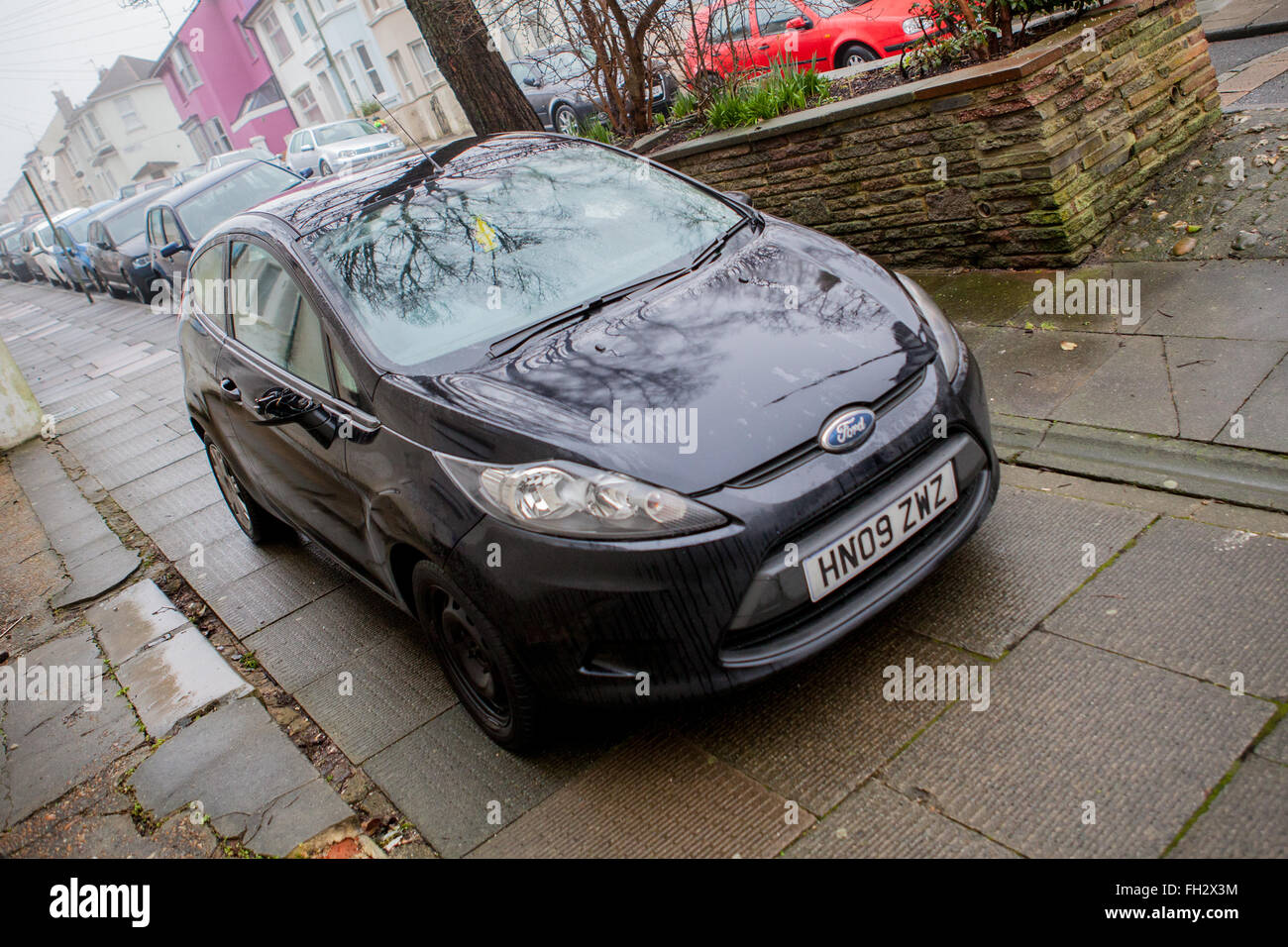 Car driving on pavement hi-res stock photography and images - Alamy