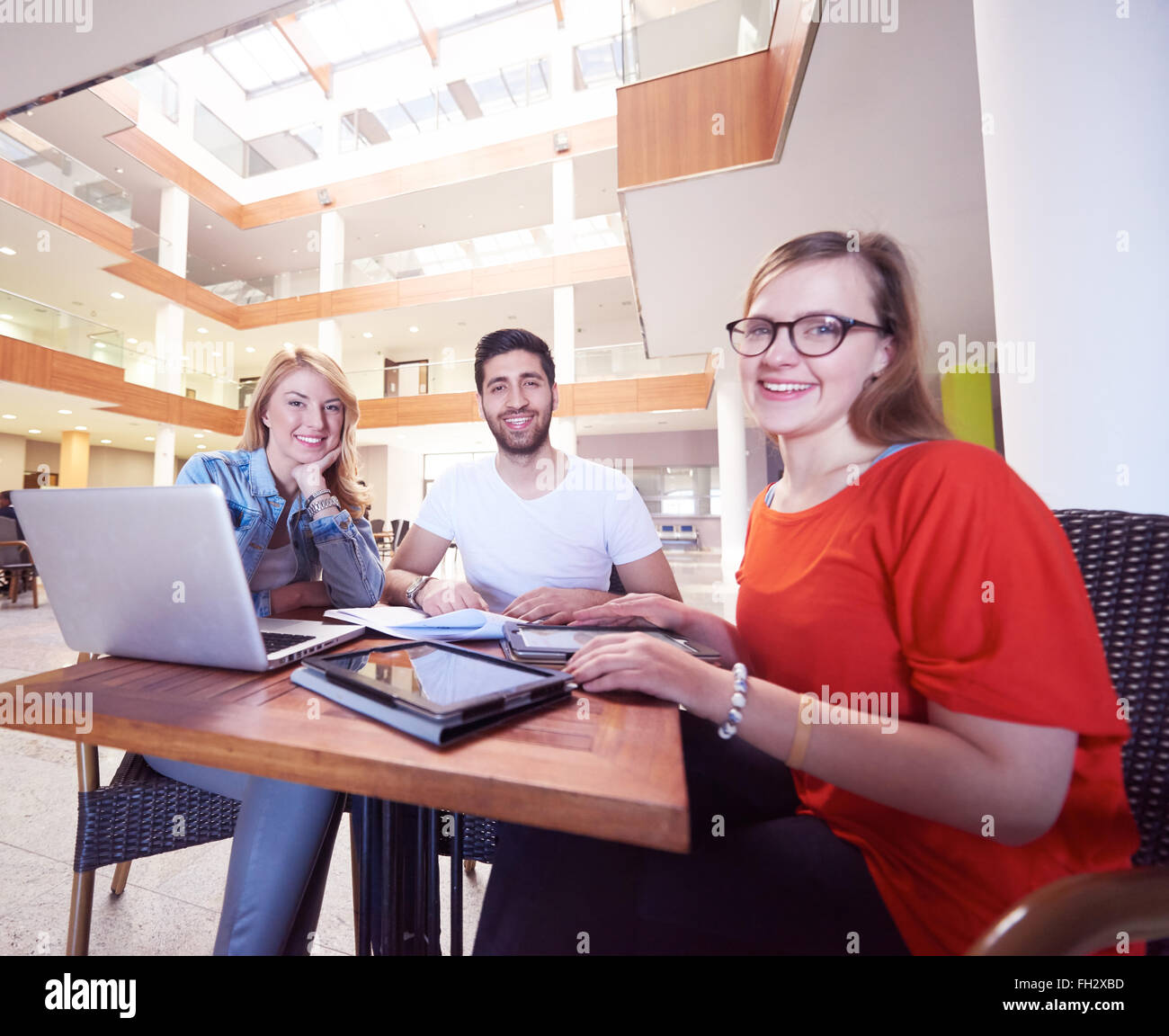 students group working on school project together Stock Photo - Alamy