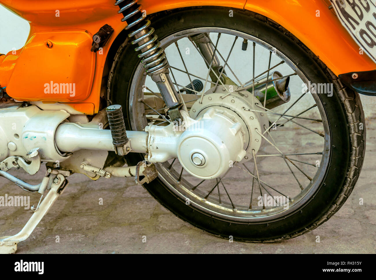 Orange vintage Motorcycle wheel Stock Photo - Alamy
