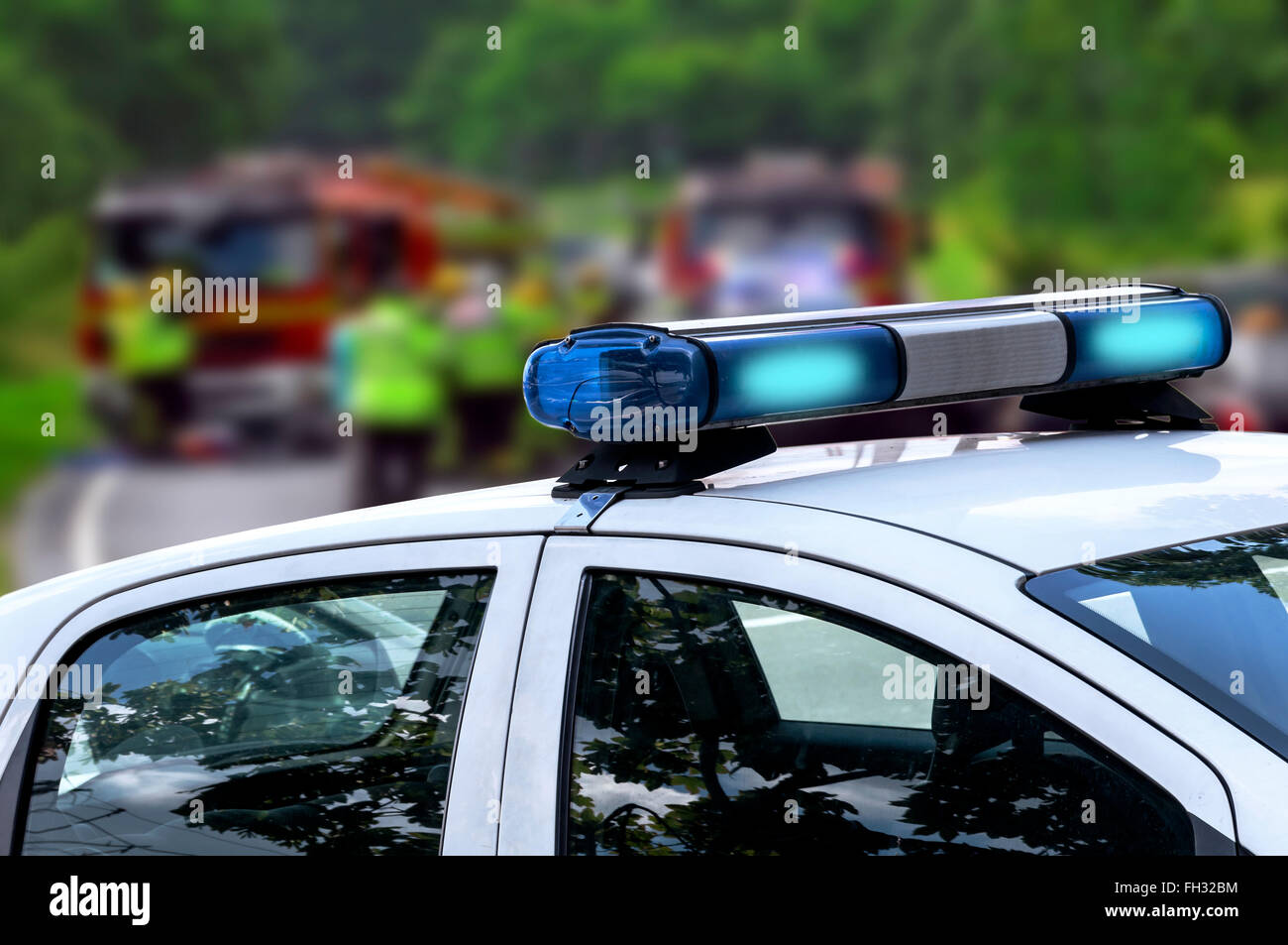 Police officer emergency service car driving street with siren light ...