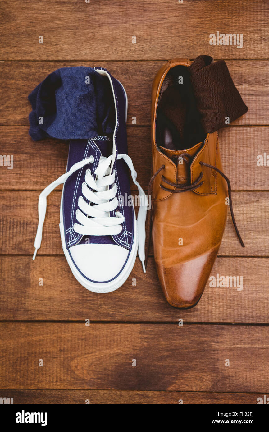 View of two different shoes Stock Photo - Alamy