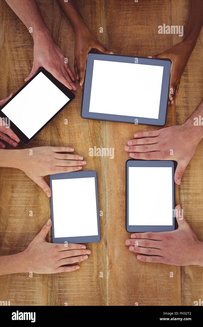 Creative team working together on a tablet and smartphones Stock Photo ...