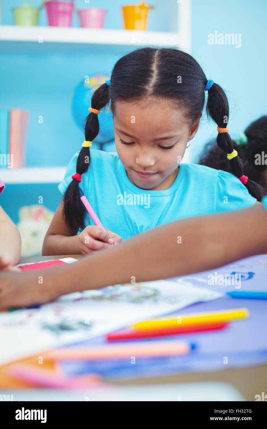 Small girl drawing a picture Stock Photo - Alamy
