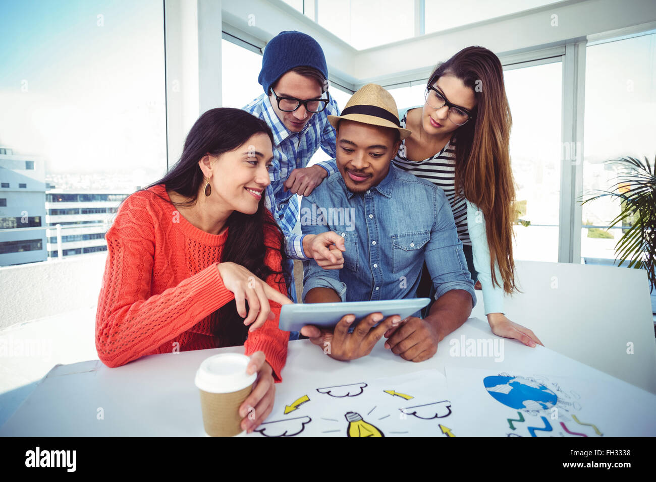 Young creative team having a meeting Stock Photo - Alamy