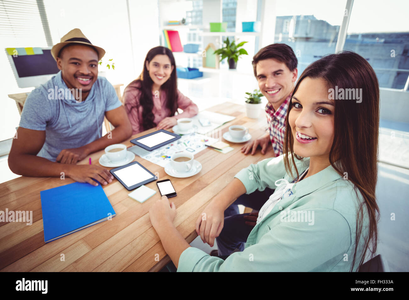 Young creative team working together Stock Photo - Alamy