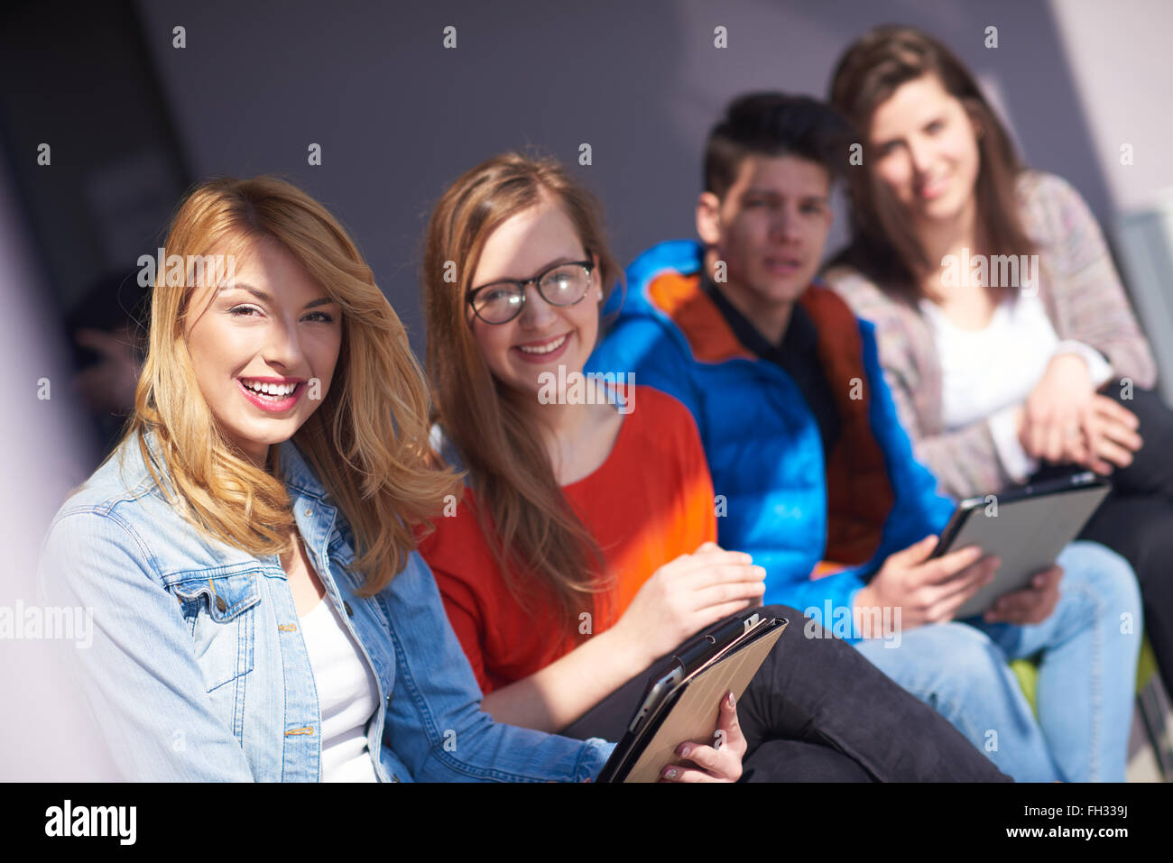 students group working on school project together Stock Photo - Alamy
