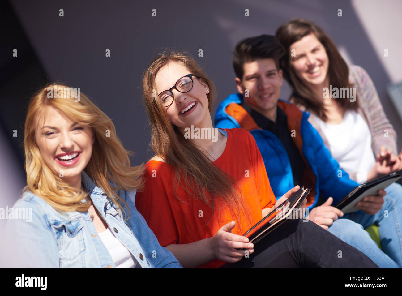 students group working on school project together Stock Photo - Alamy