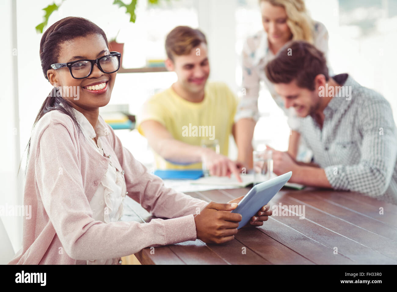 Creative business team working hard together Stock Photo - Alamy