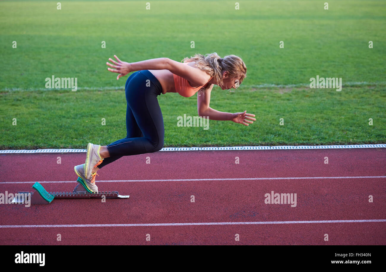 pixelated design of woman sprinter leaving starting blocks Stock Photo ...