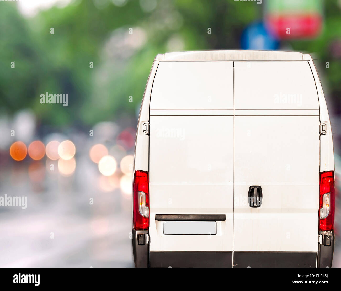 White city Van on road Stock Photo - Alamy