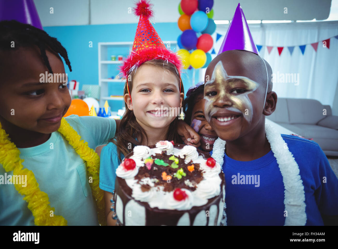 Happy kids gathered together Stock Photo - Alamy