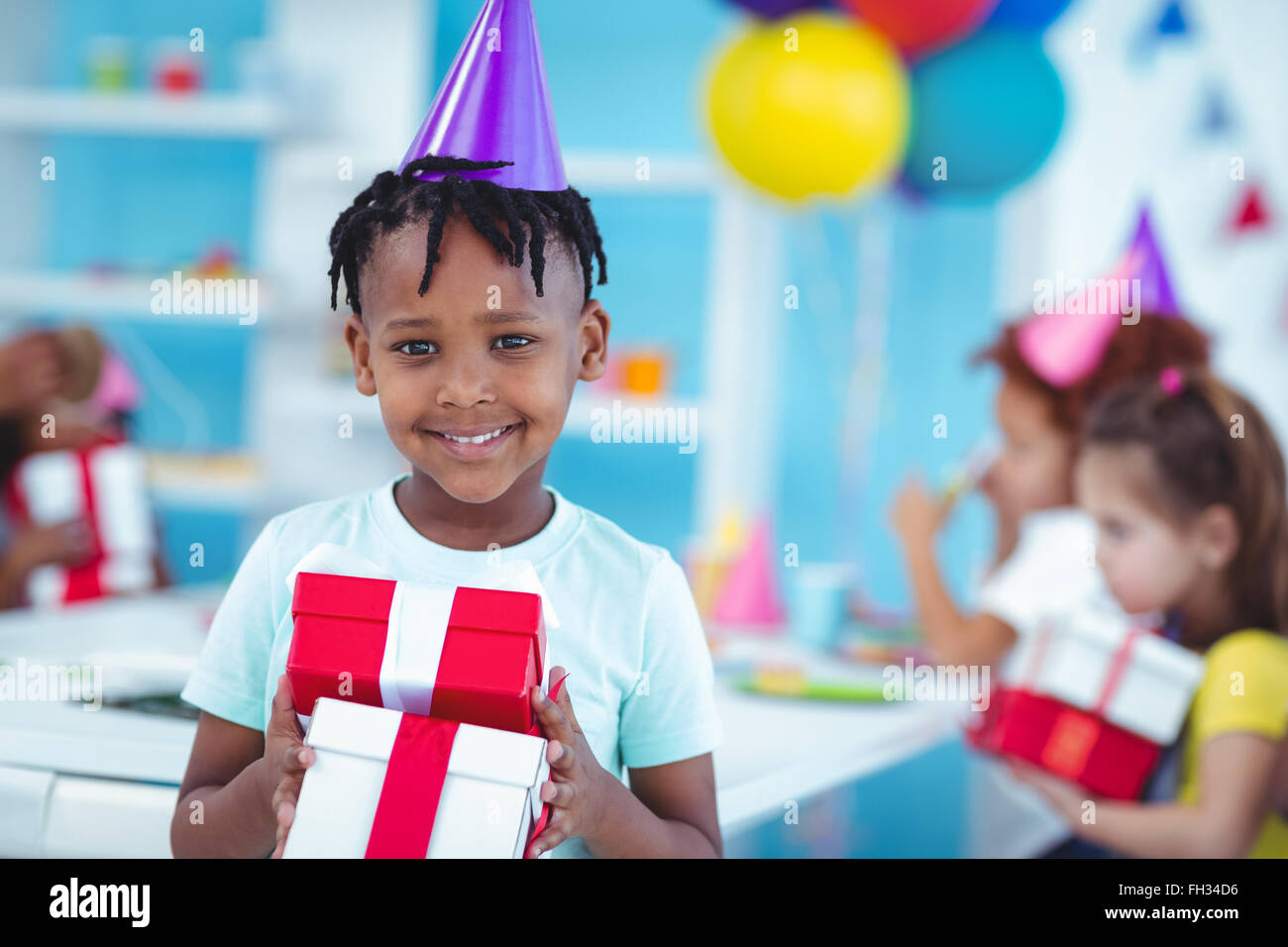 Happy kids at a birthday party Stock Photo - Alamy