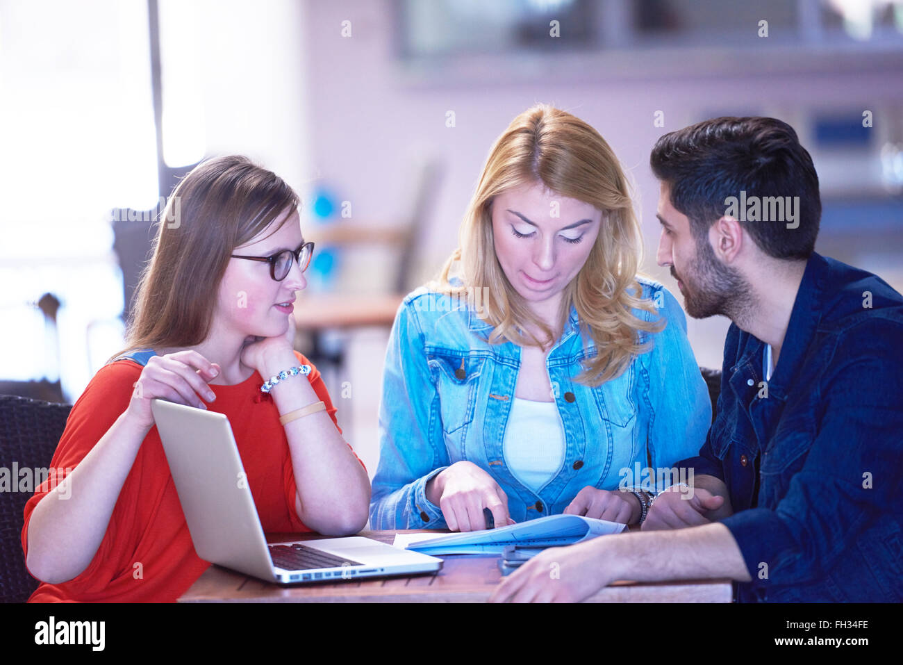 students group working on school project together Stock Photo - Alamy