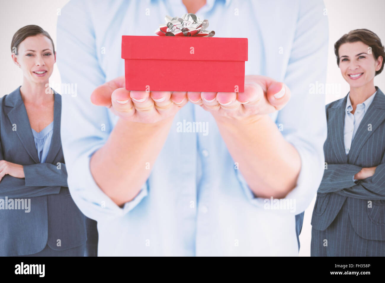 Composite image of womans hands presenting Stock Photo - Alamy