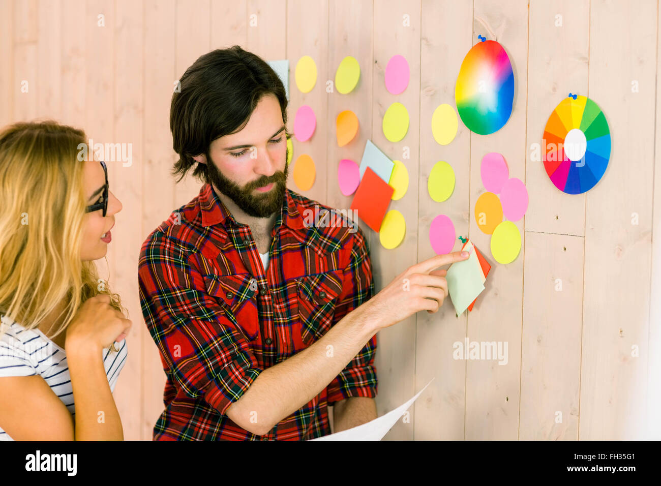 Creative team brainstorming together Stock Photo - Alamy