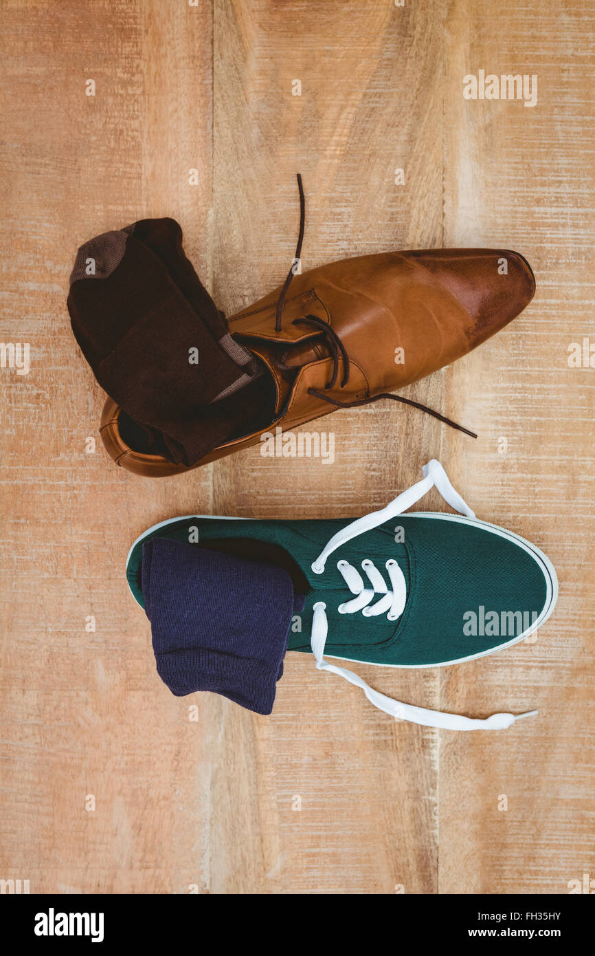 View of two different shoes Stock Photo - Alamy