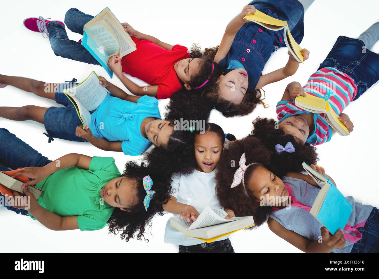 Girls reading books together hi-res stock photography and images - Alamy