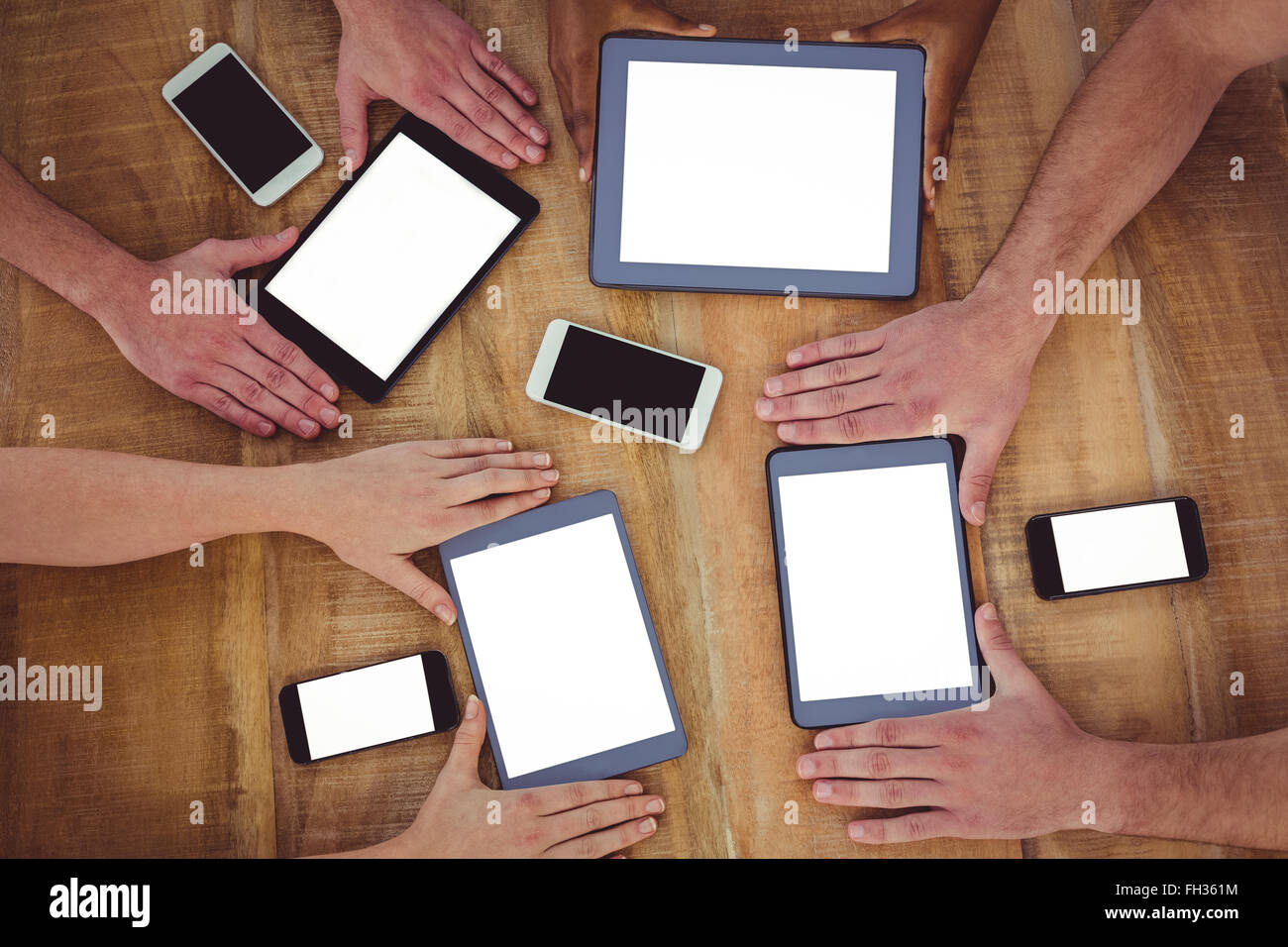 Creative team working together on a tablets and smartphones Stock Photo ...