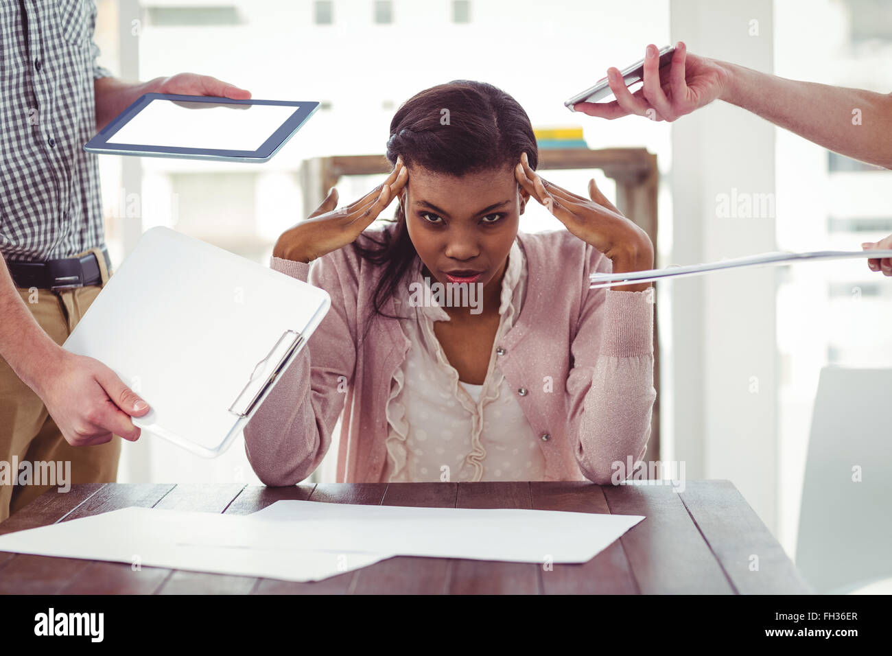 Businesswoman stressed out at work Stock Photo - Alamy