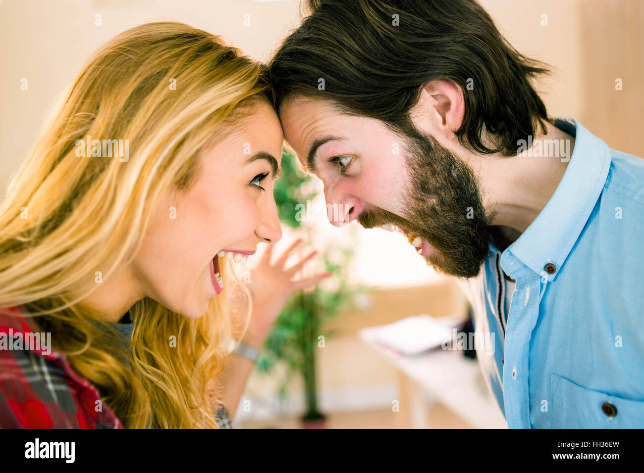 Creative team shouting at each other Stock Photo - Alamy