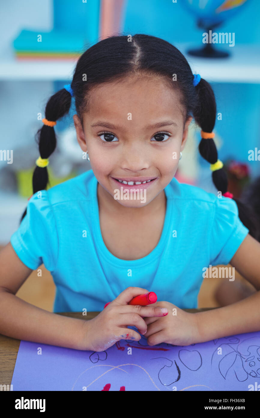 Small girl drawing a picture Stock Photo - Alamy